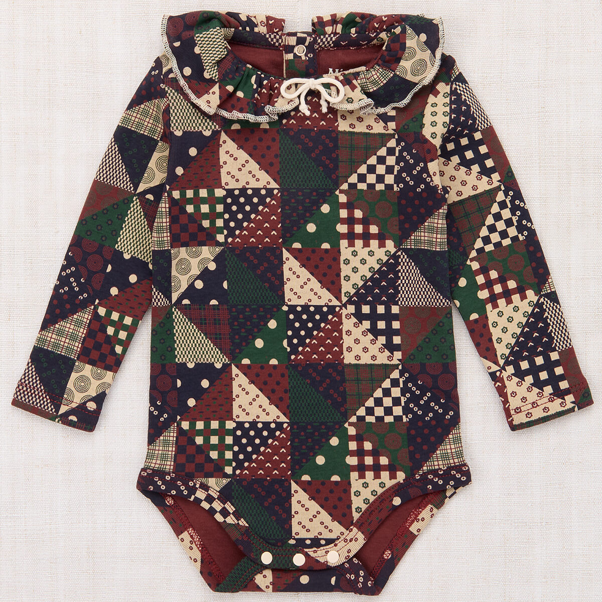Baby Pattie Onesie in Madder Root Patchwork by Misha & Puff – Junior ...